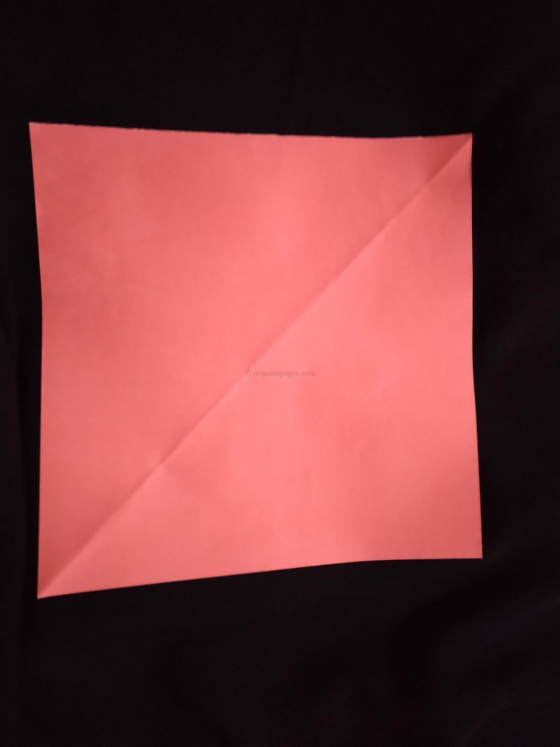 How to make an Origami kissing lips step by step.