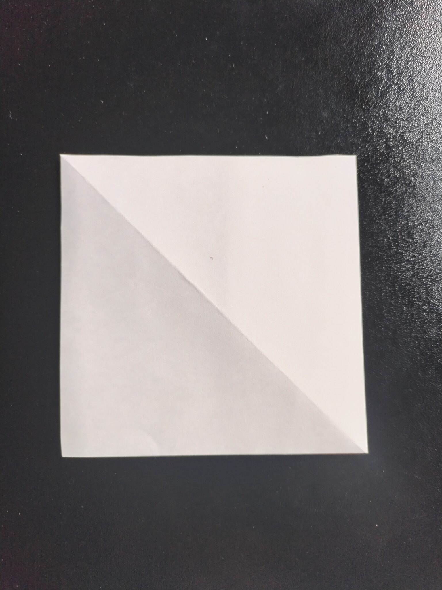 How to Make an Origami Santa Hat: A Festive Paper Craft for All